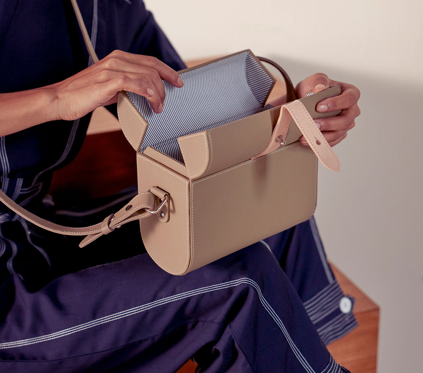 CAPSULE SLING BAG – Nappa Dori Global